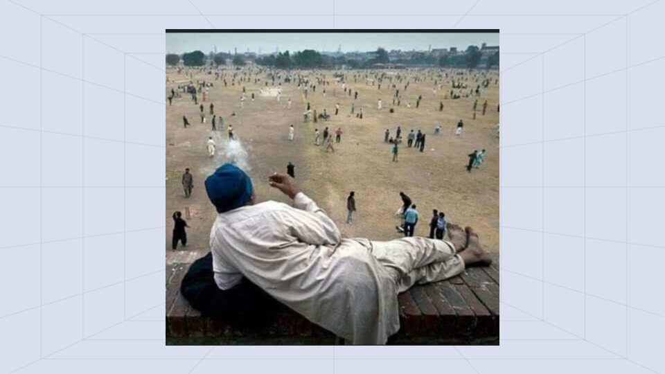 Indian Man Watches Battle While Smoking - AI Memes Template